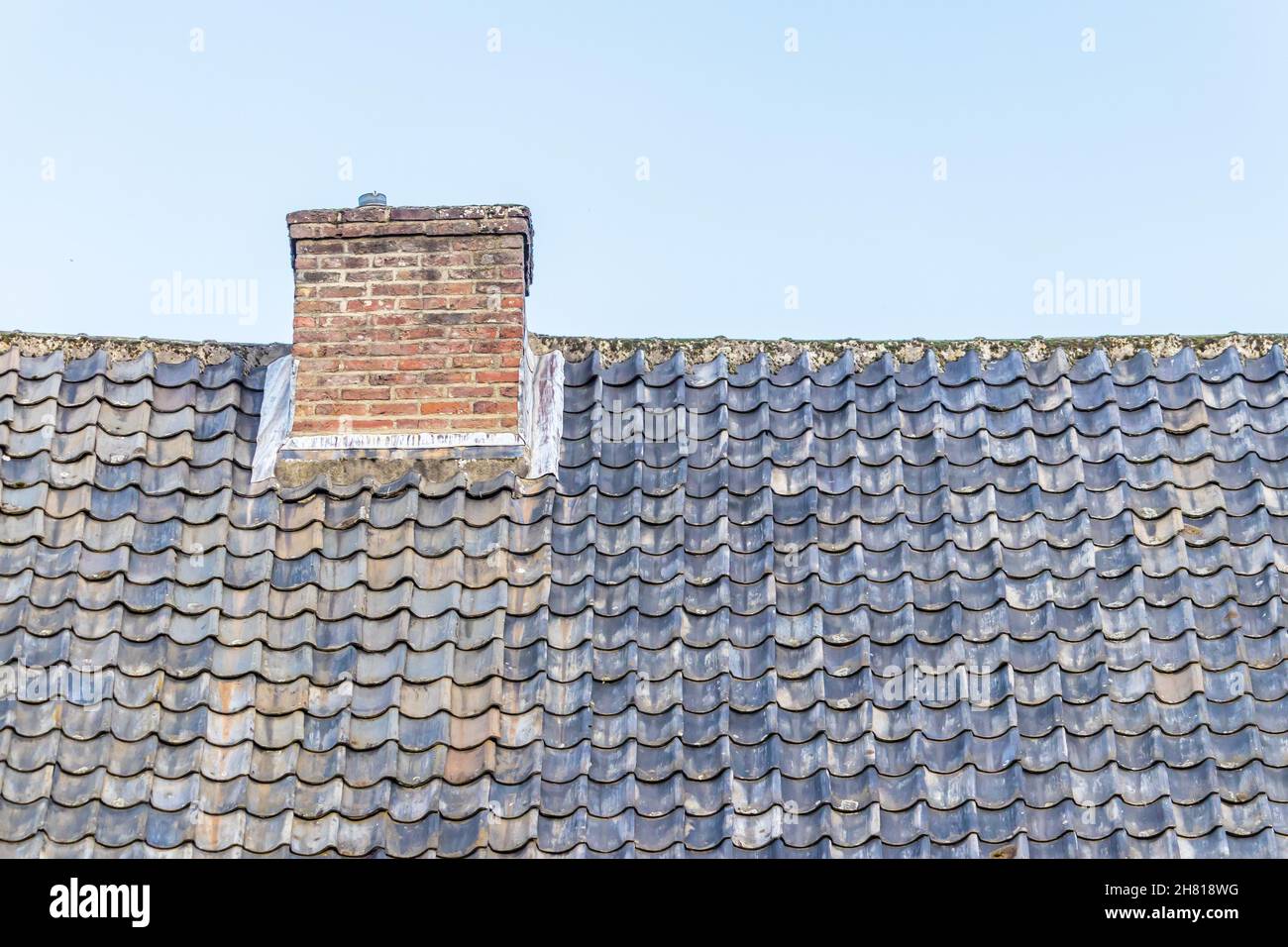 Brick chimney stack on the modern contemporary house rooftop Stock ...