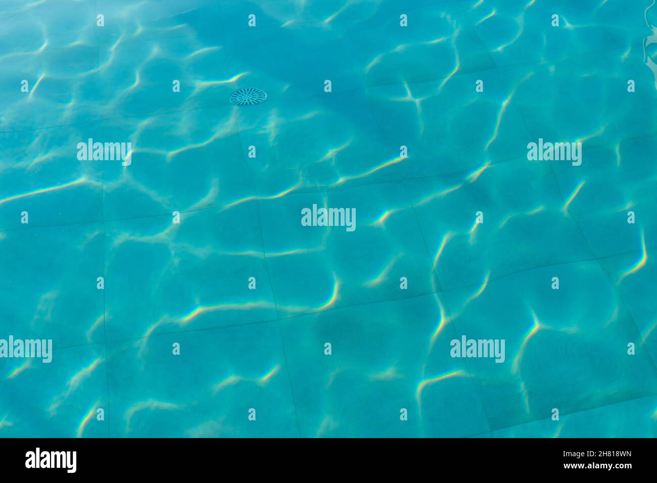 Beautiful refreshing blue swimming pool water Stock Photo - Alamy