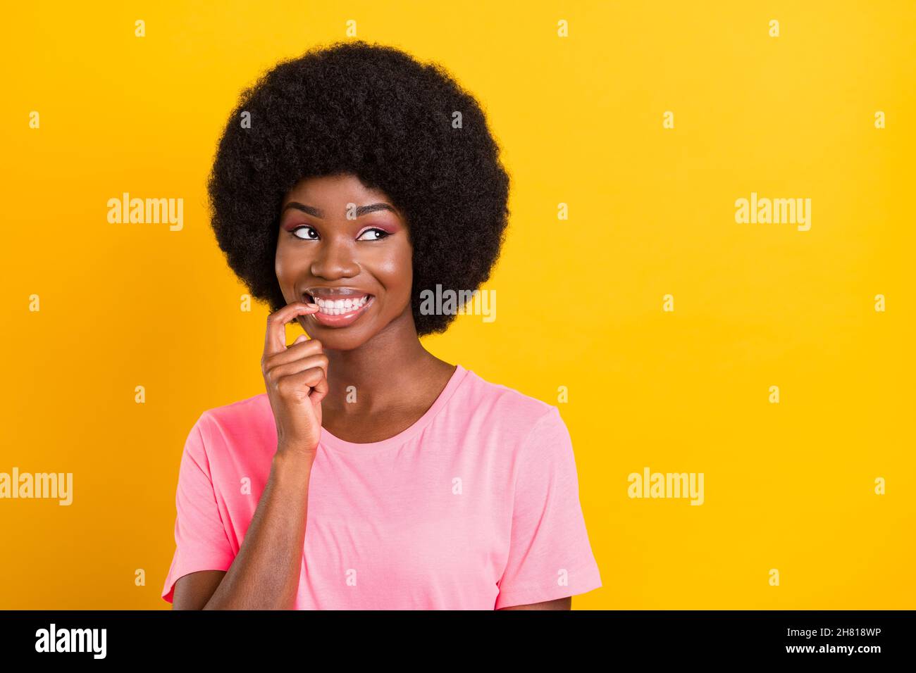 Photo of young black girl happy positive smile finger touch teeth ...