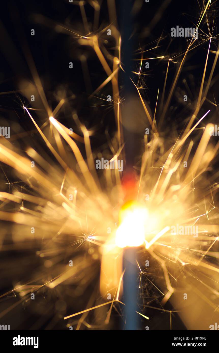 Sparkling sparkler, black background Stock Photo - Alamy