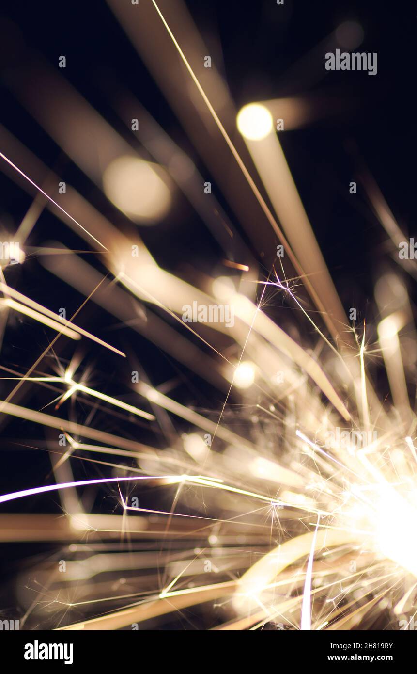 Sparkling sparkler, black background Stock Photo - Alamy