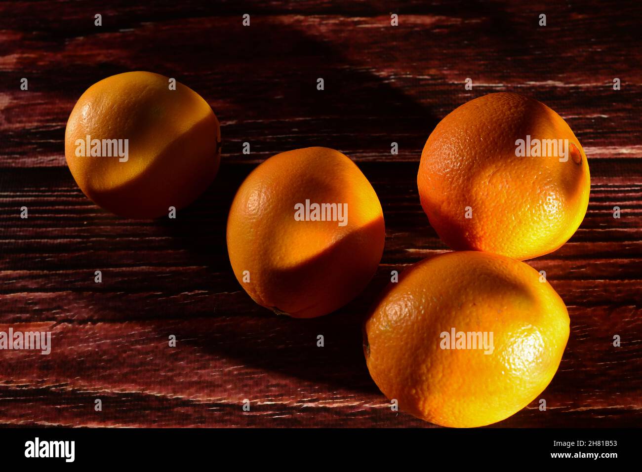 Oranges fruits on the table. Orange color Stock Photo - Alamy