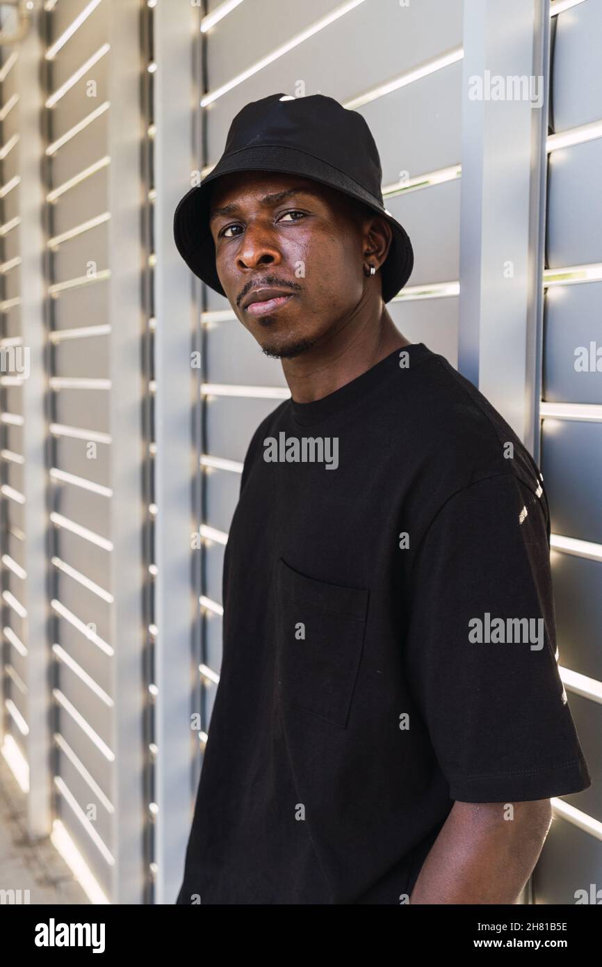 Man behind shutters hi-res stock photography and images - Alamy