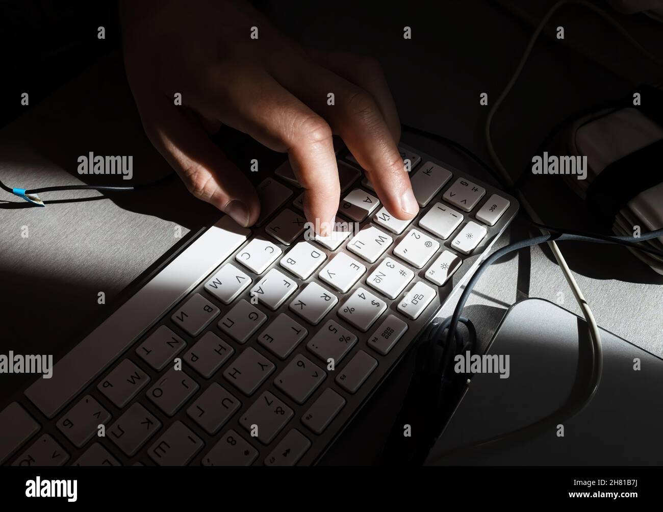 Hand and computer keyboard close up. Man working at home office hand on ...