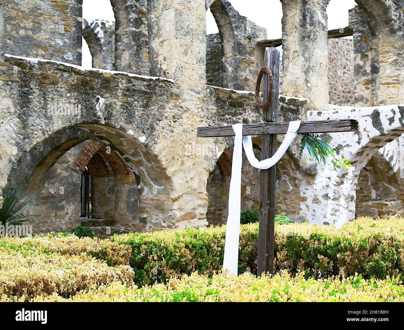 Cross in front of old ruins of an ancient monastery Stock Photo - Alamy