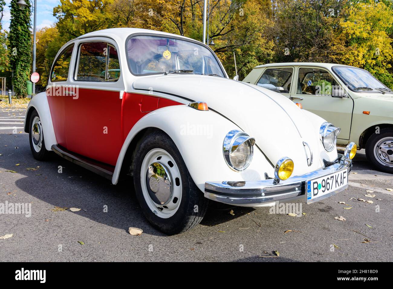 Bucharest, Romania, 24 October 2021: One vivid red and white Volkswagen ...