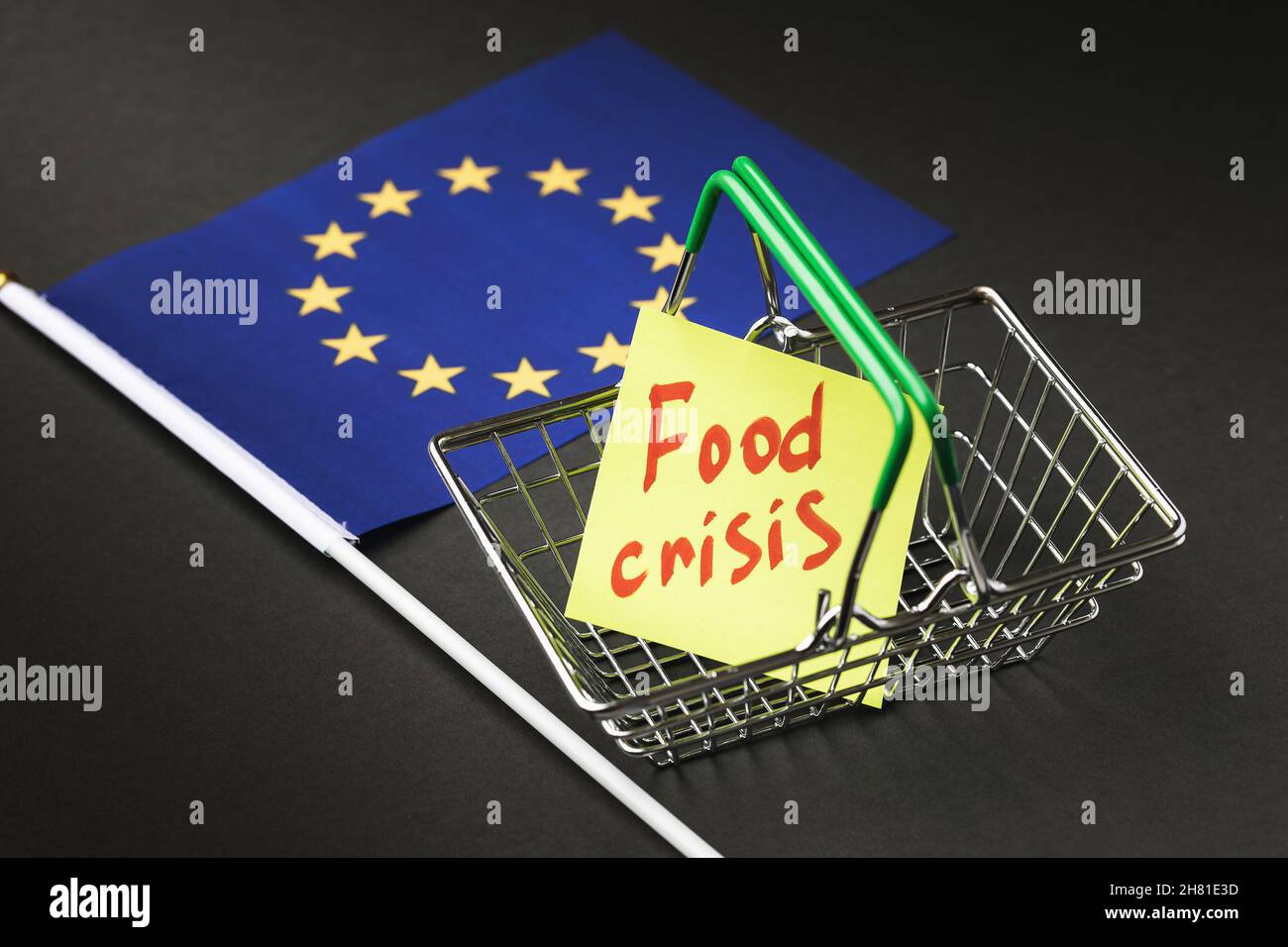 European flag and note with text in empty food basket, European Union ...