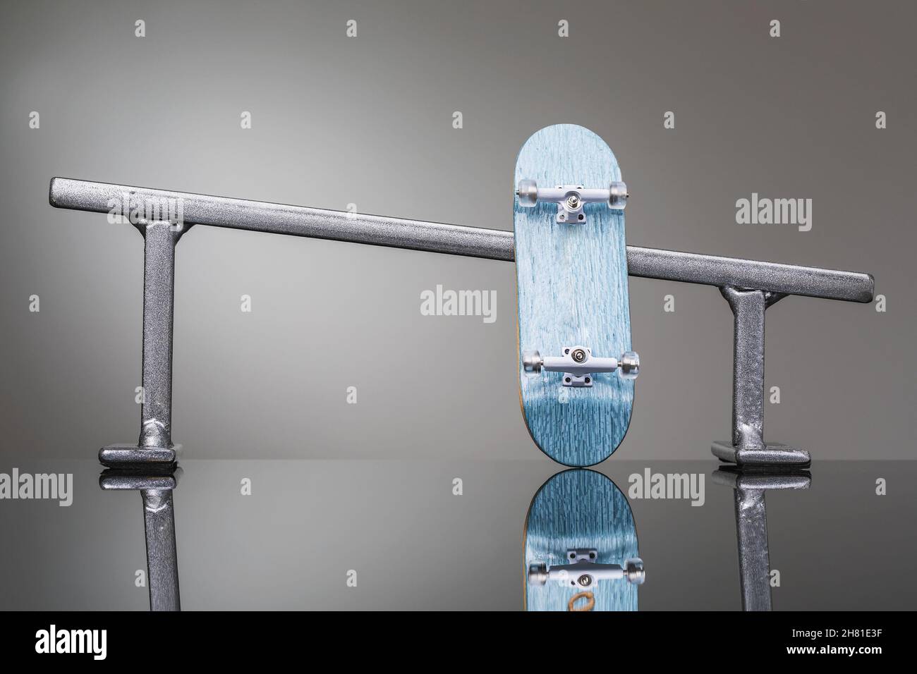 Fingerbord and metal railings of silver color on a gradient background ...