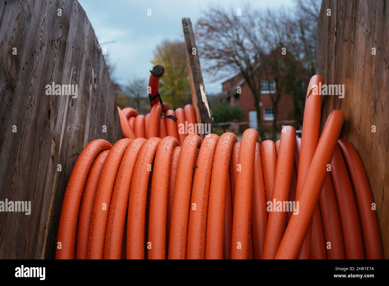 Two fiber optic conduit reels with speed pipes in a rural area near ...