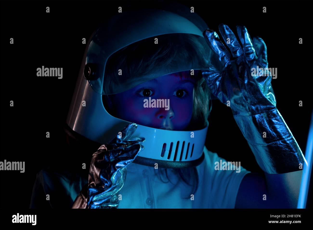 Kid boy exploring space. Portrait of cute kids in space suits ...