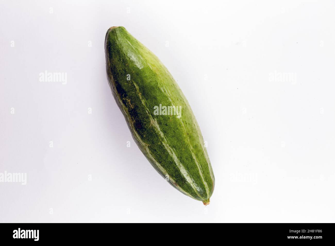 Top view of young unripe healthy organic fresh unpeeled pointed gourd ...