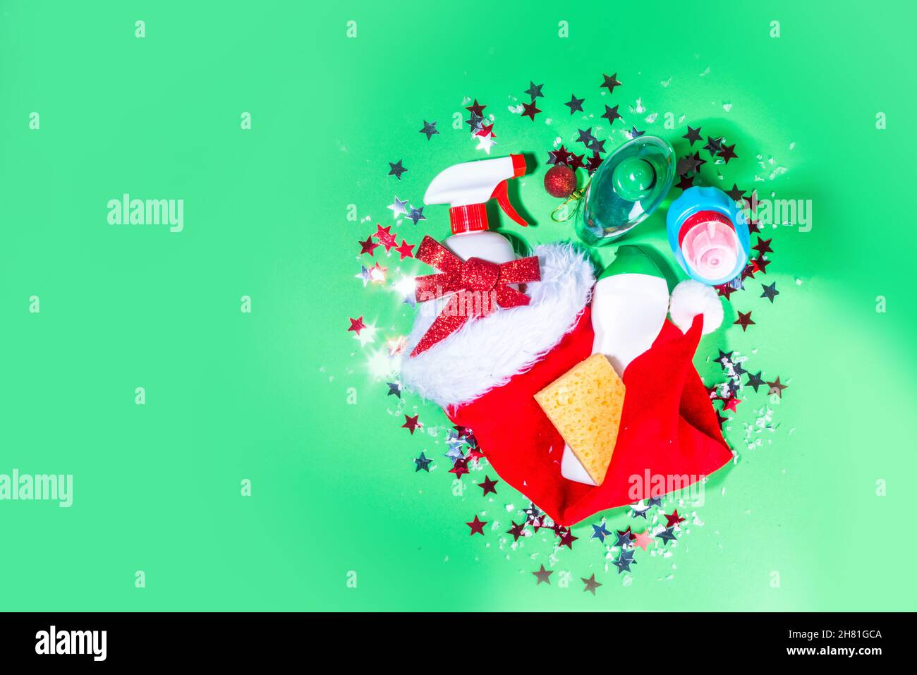 Christmas cleaning concept. Various bottles, equipment, and accessories ...