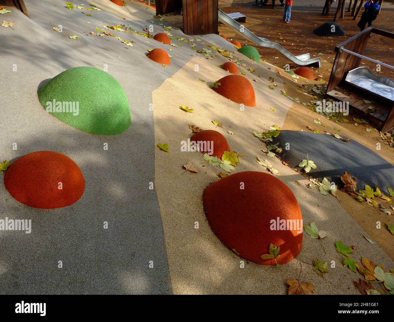 playground. public park.colorful orange, yellow and green rubber safety ...