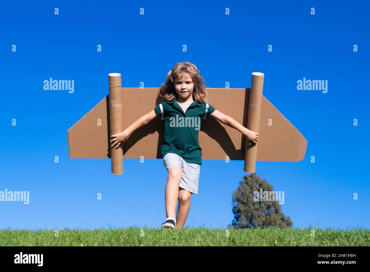 Boy child with wings at sky imagines a pilot and dreams of flying Stock ...