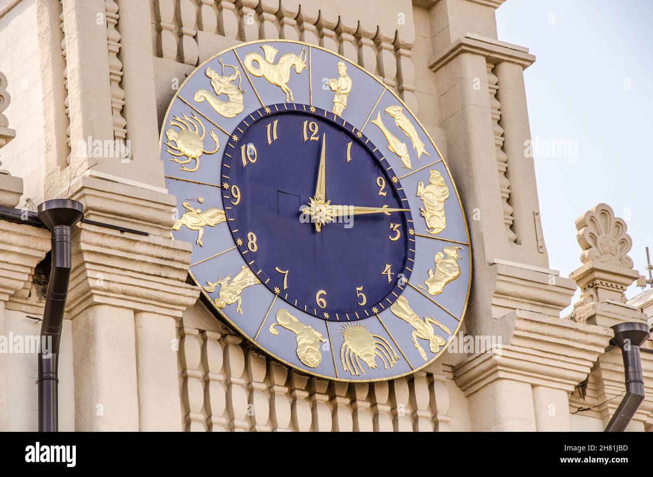the tower clock close up with the signs of the Zodiac Stock Photo - Alamy