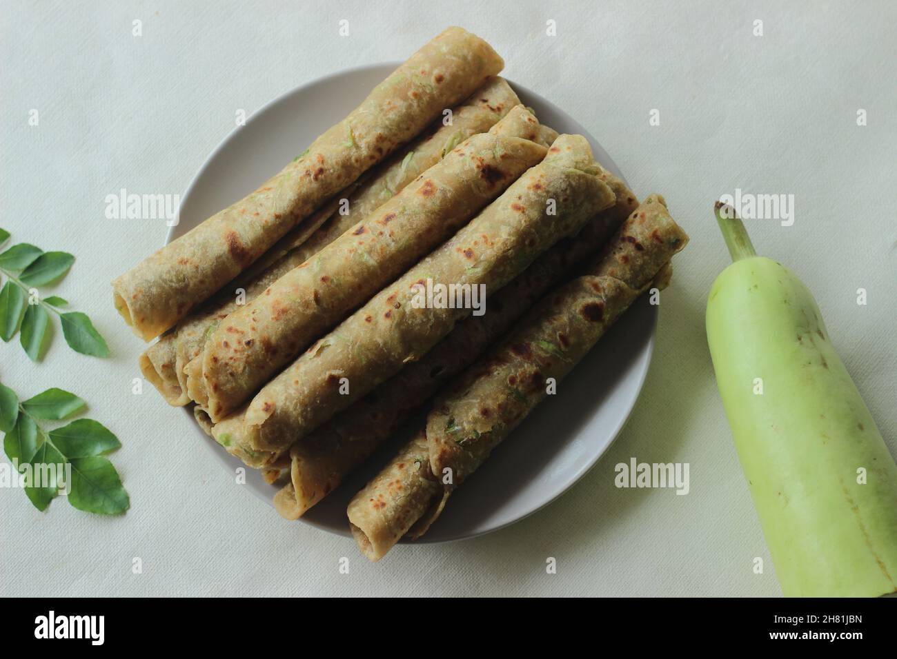 Indian flat bread made of whole wheat flour, grated bottle guard ...