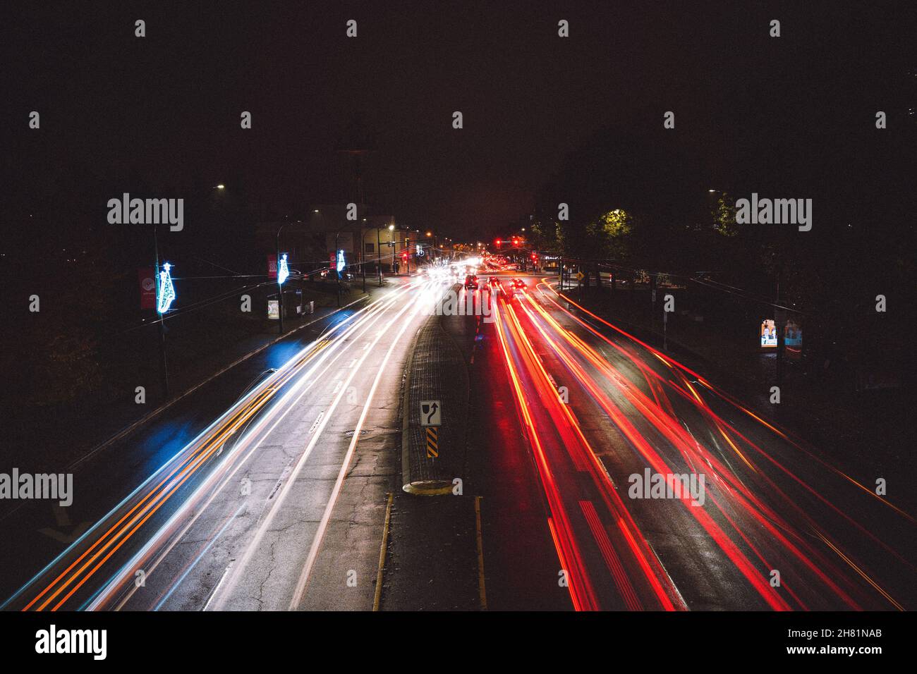Street with blurred car lights in motion at night Stock Photo - Alamy