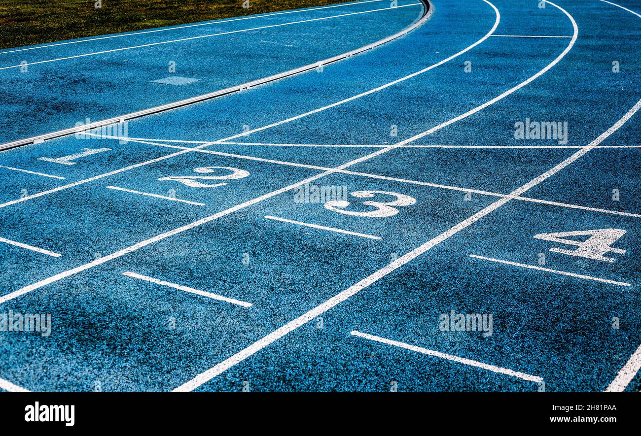 Lane one on the track field Stock Photo - Alamy