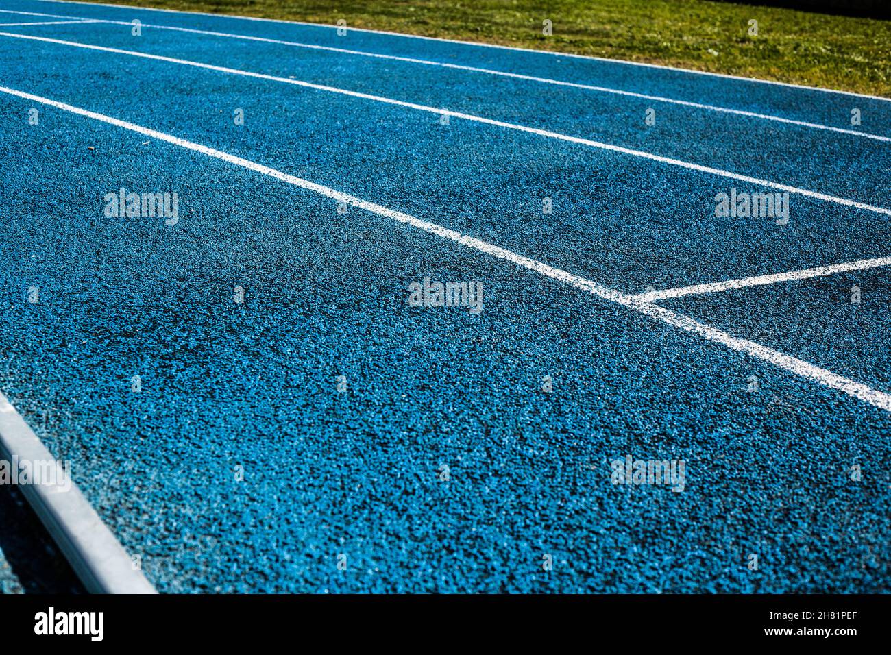 Lane one on the track field Stock Photo - Alamy