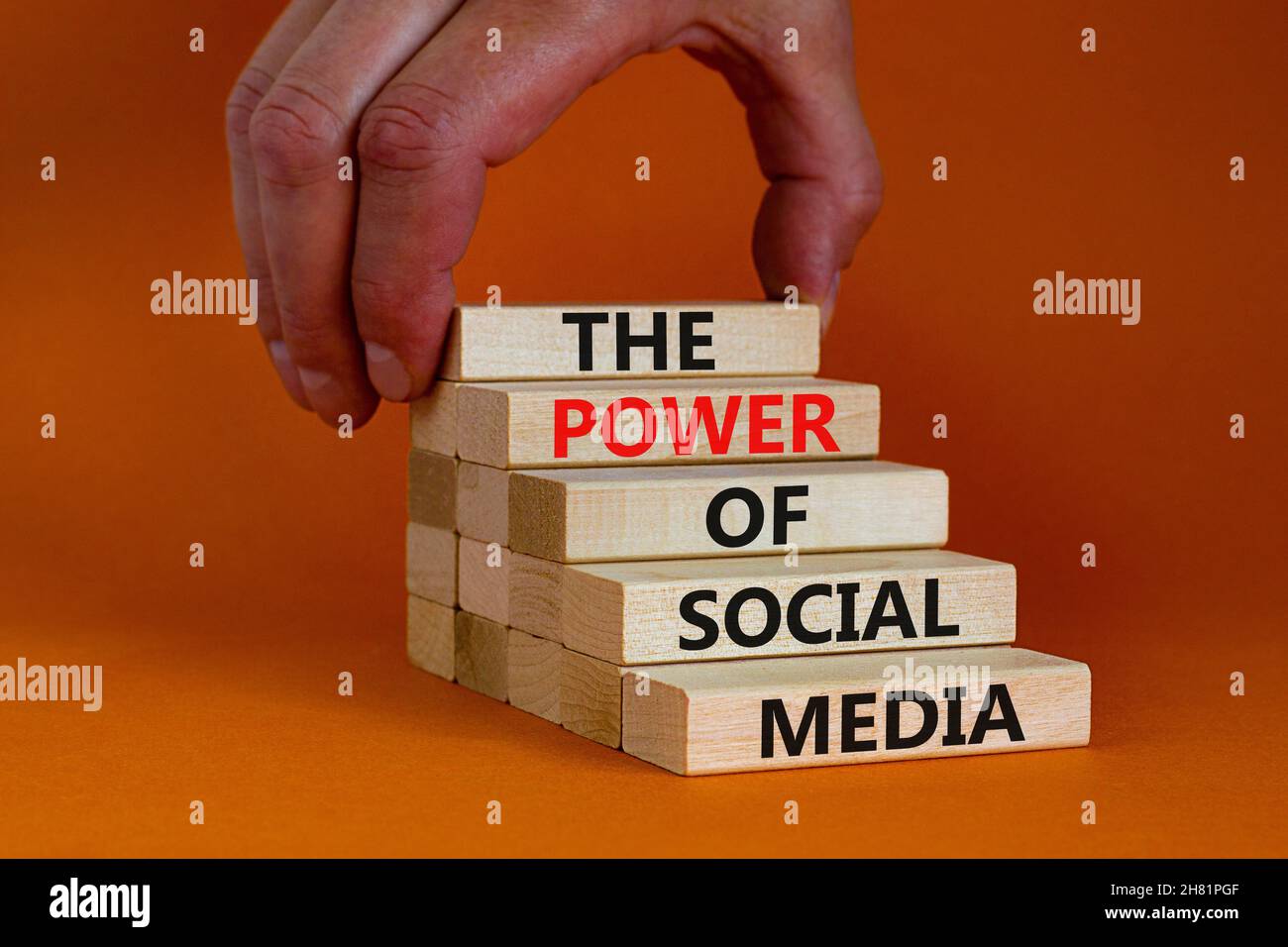 Power of social media symbol. Wooden blocks with words The power of ...