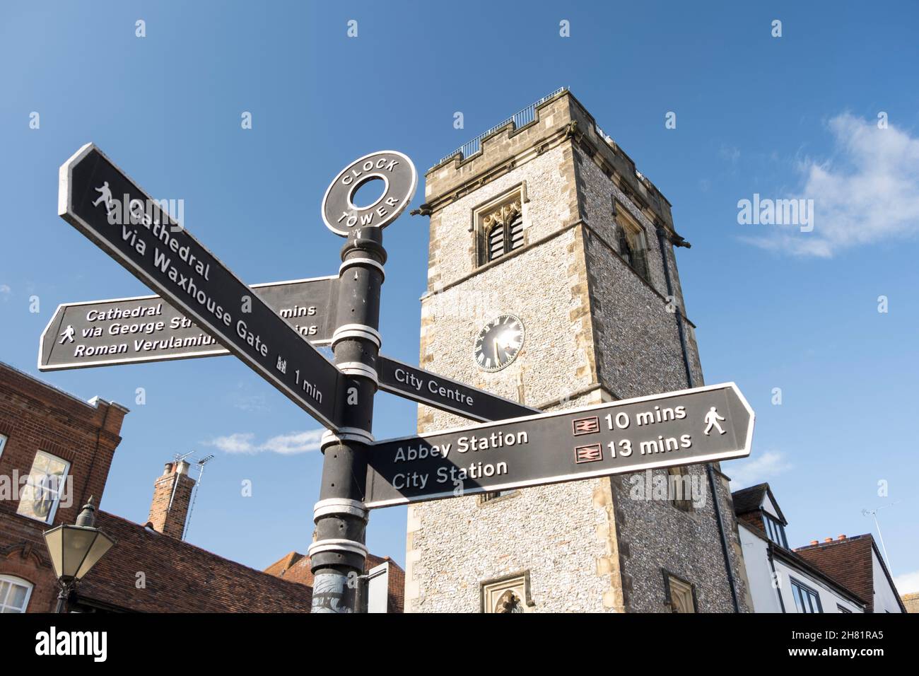 St Albans clock tower and tourist signpost, St Albans, Hertfordshire ...