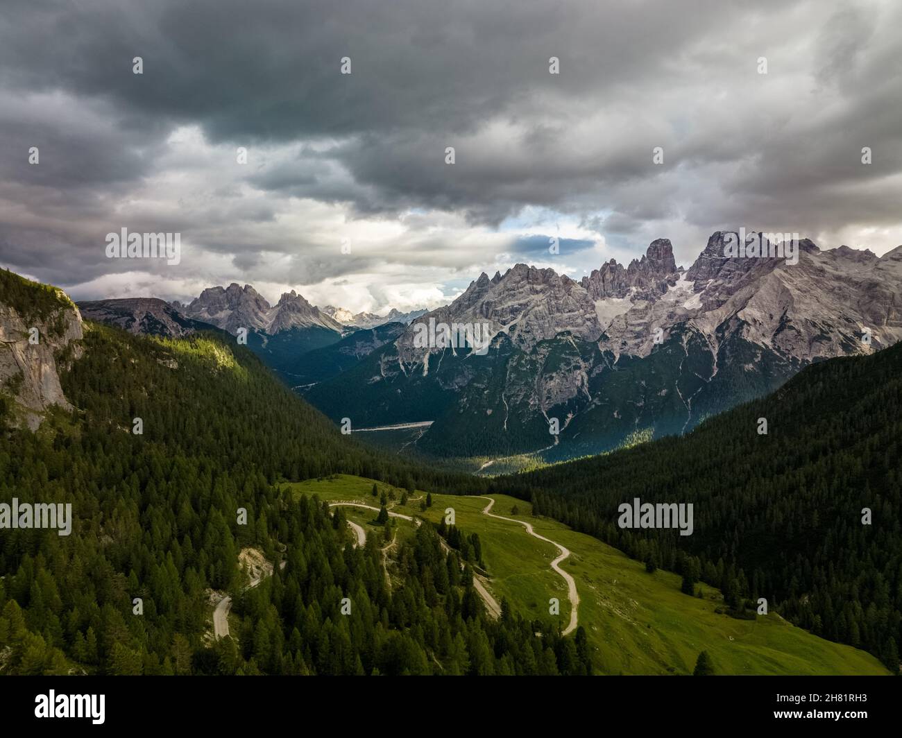 Eerie scenery of the meajestic Dolomite Mountains before a storm in It ...