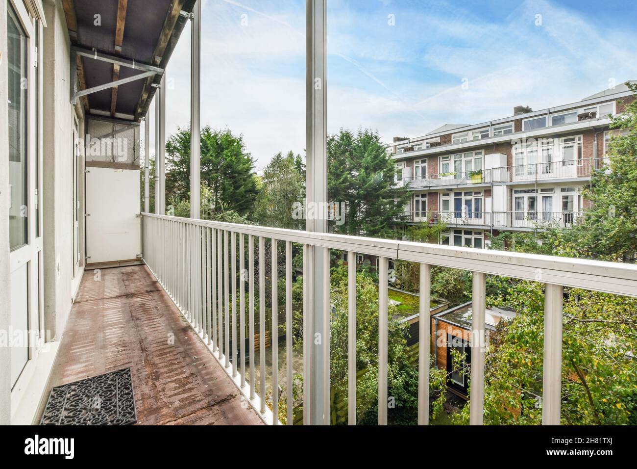 Stunning long narrow balcony with mesmerizing views Stock Photo - Alamy