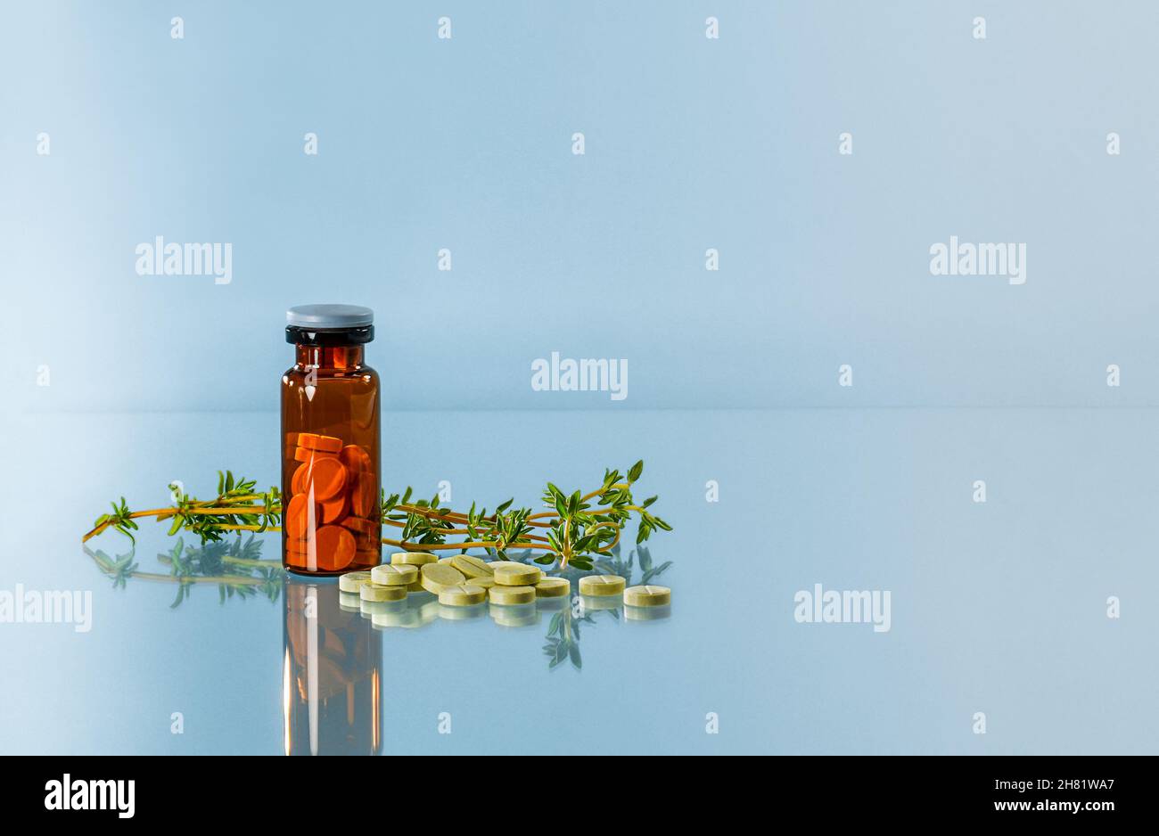 Bottle with natural tablets with extract of medicinal thyme herb Stock ...