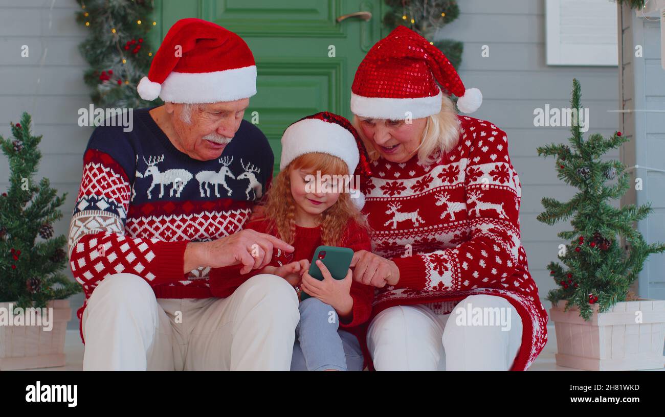 Mature christmas grandfather man mobile hi-res stock photography and ...