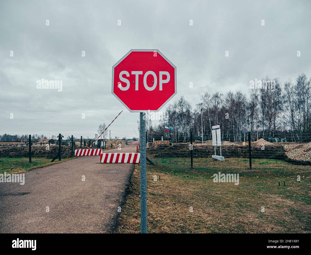Road checkpoint with STOP sign. Peacekeeping Force Post. Blocking the ...