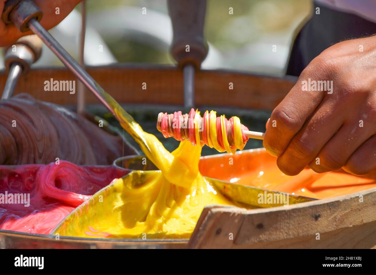salesman prepare traditional turkish candy stick on street Stock Photo ...