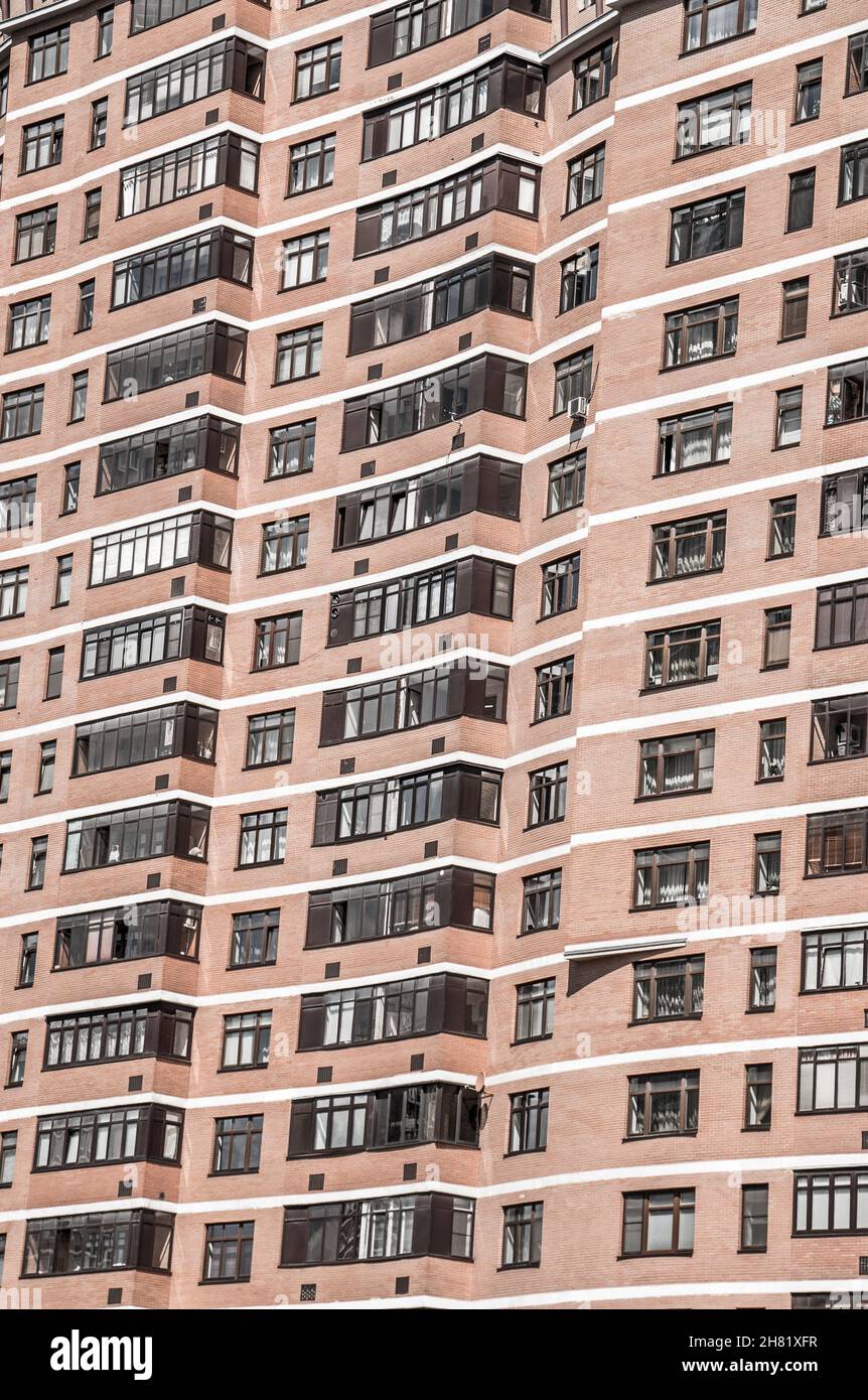 New high-rise brick building close up Stock Photo - Alamy