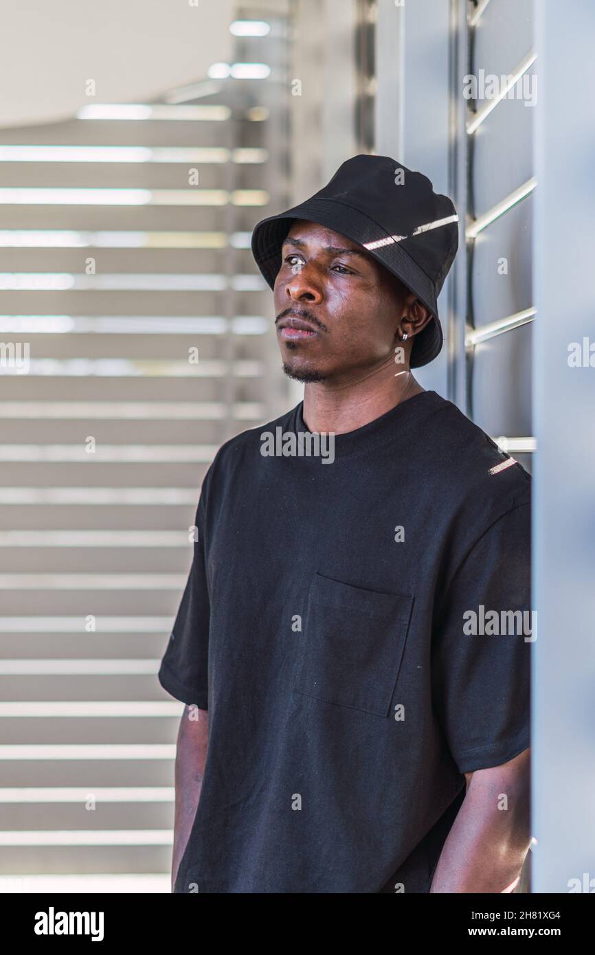 Man behind shutters hi-res stock photography and images - Alamy