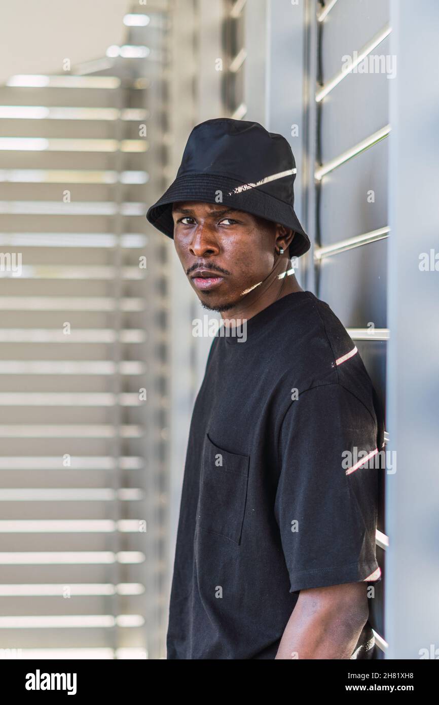 Man behind shutters hi-res stock photography and images - Alamy