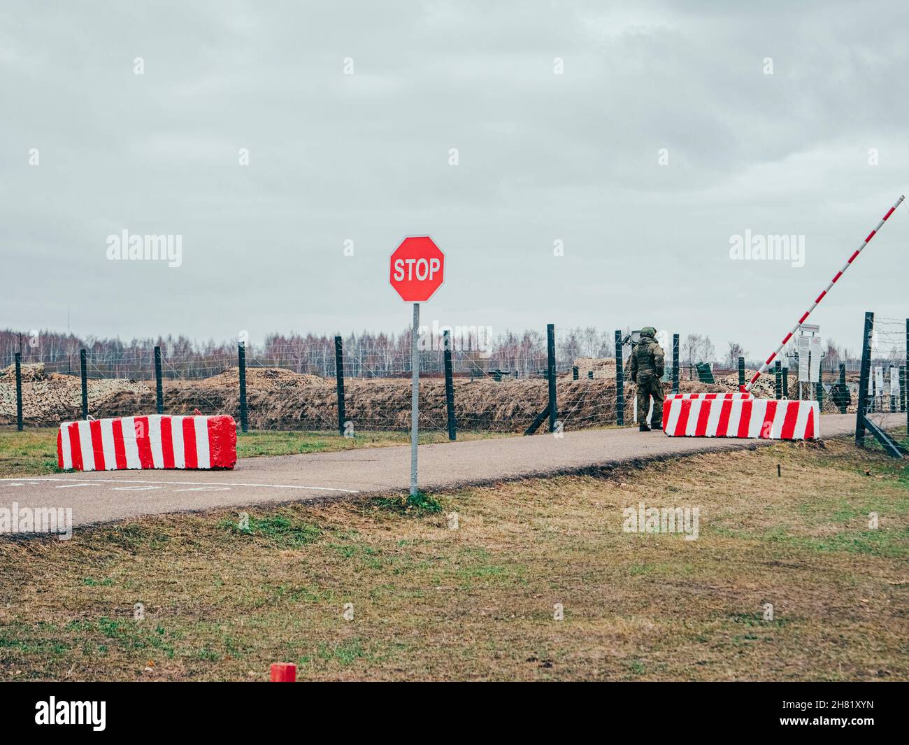Road checkpoint with STOP sign. Peacekeeping Force Post. Blocking the ...