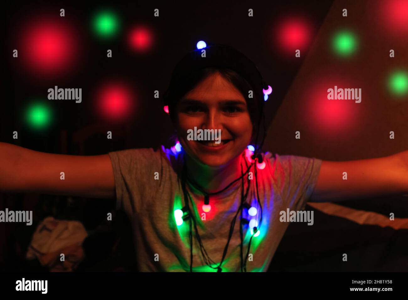 Defocus Christmas millennial hug. Close-up crazy happy young woman ...