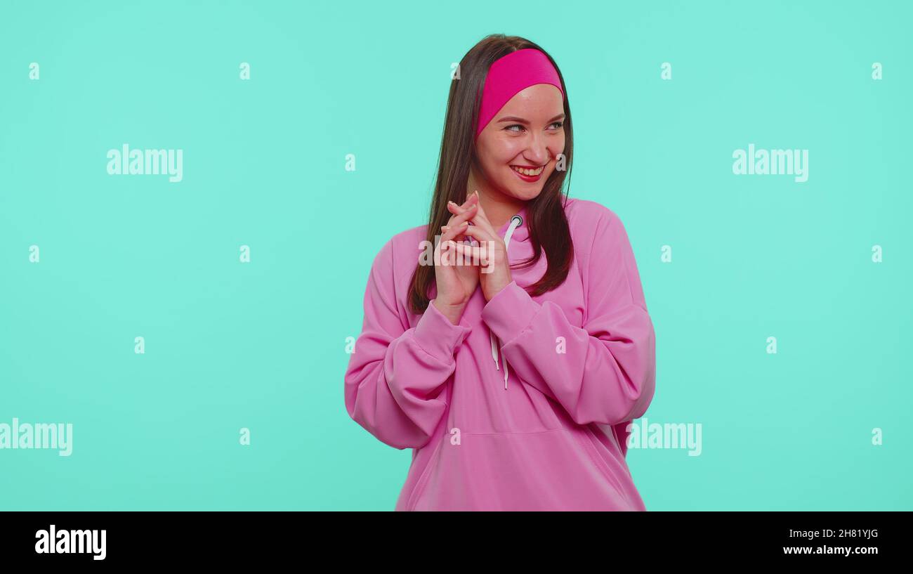Sneaky cunning girl with tricky face scheming evil plan, thinking over ...