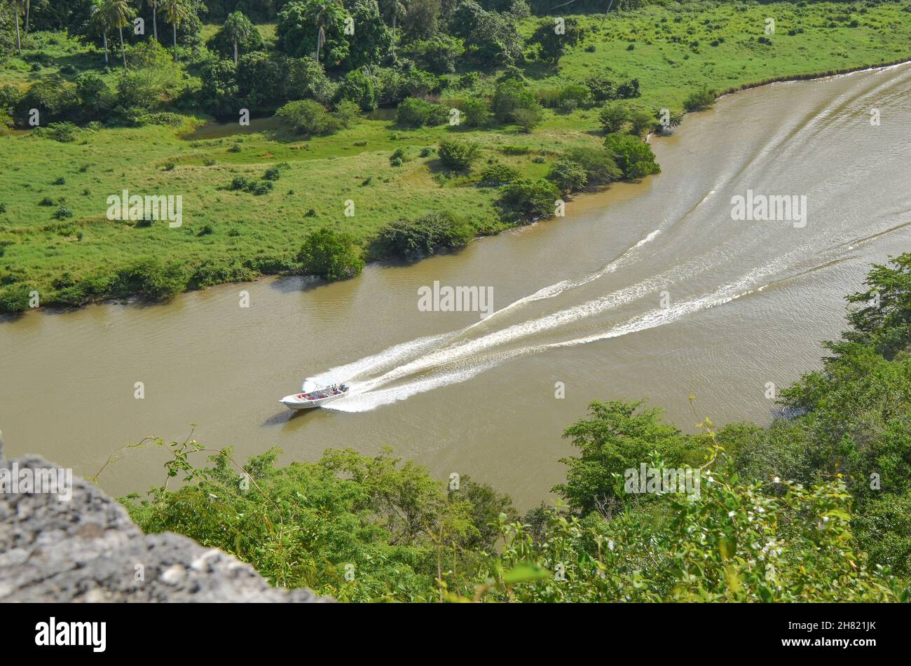 Boat floating on the river Stock Photo - Alamy