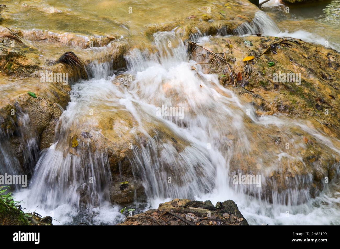 Water flowing over stones hi-res stock photography and images - Alamy