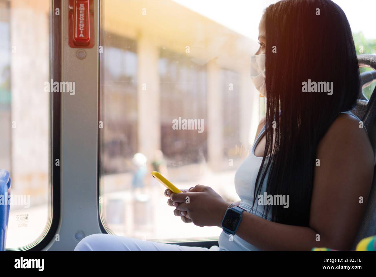 Woman looking out bus window hi-res stock photography and images - Alamy