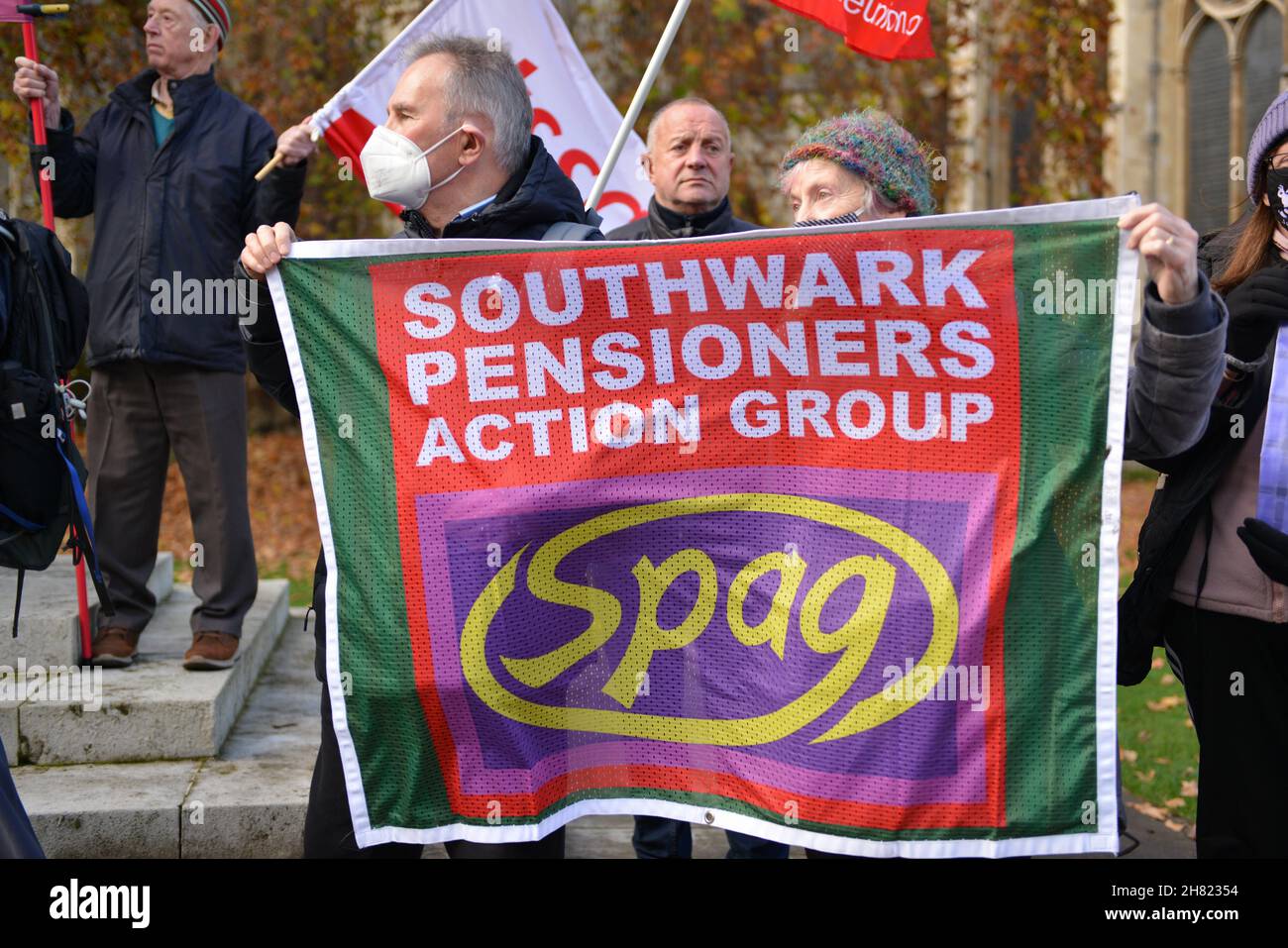 Protesters hold a banner during the demonstration opposite the Old ...