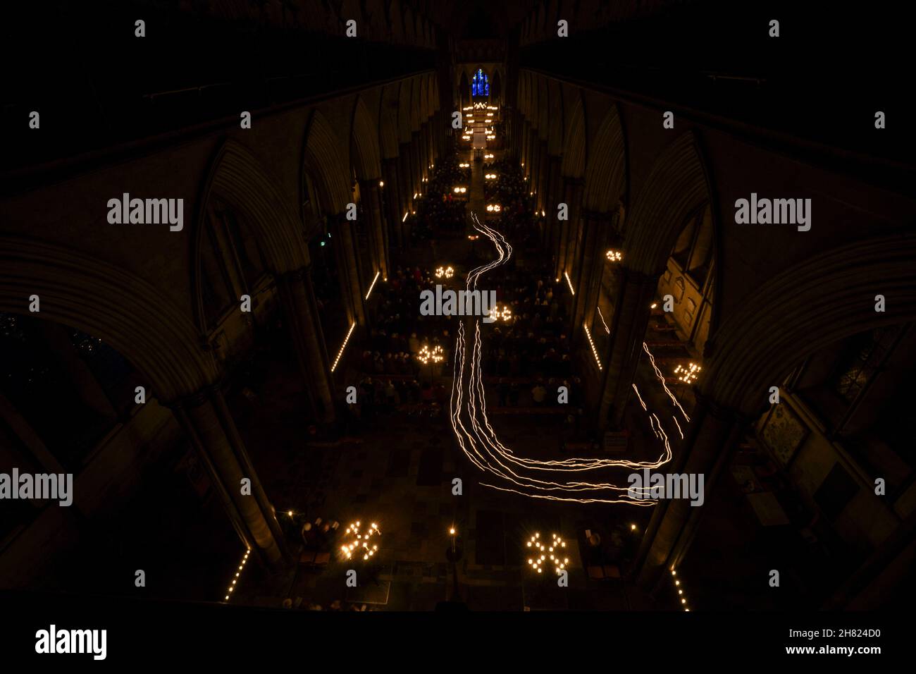 Candles are carried through Salisbury Cathedral during the advent ...