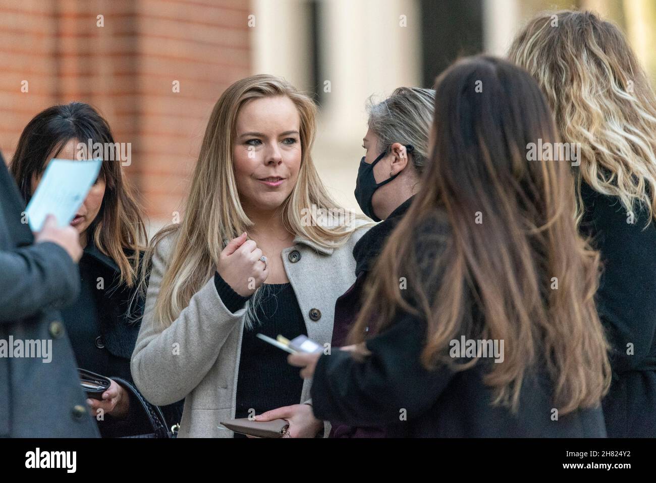 Female mourners arriving for the funeral service requiem mass for ...