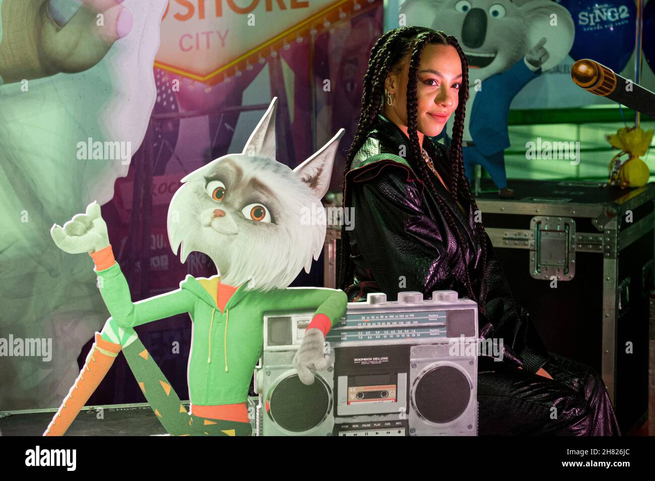 Turin, Italy. 26 November 2021. Valentina Vernia poses next to placard ...