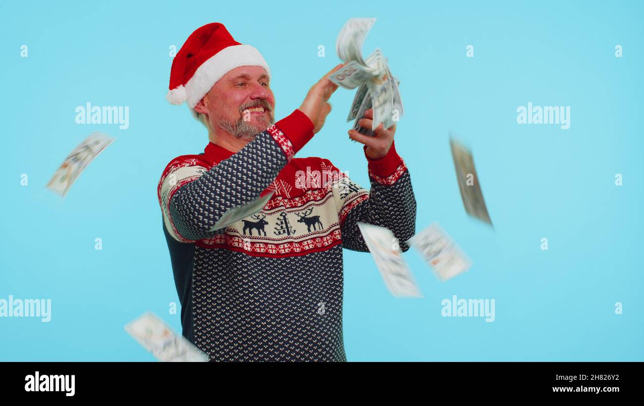 Santa claus throwing gift hi-res stock photography and images - Alamy