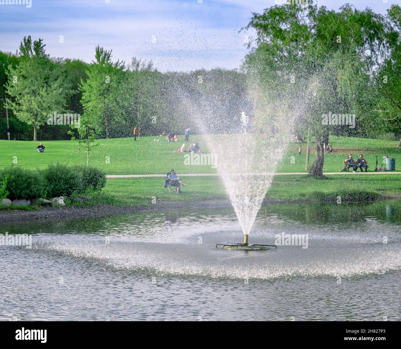 Beautiful fountain in a public garden Stock Photo - Alamy