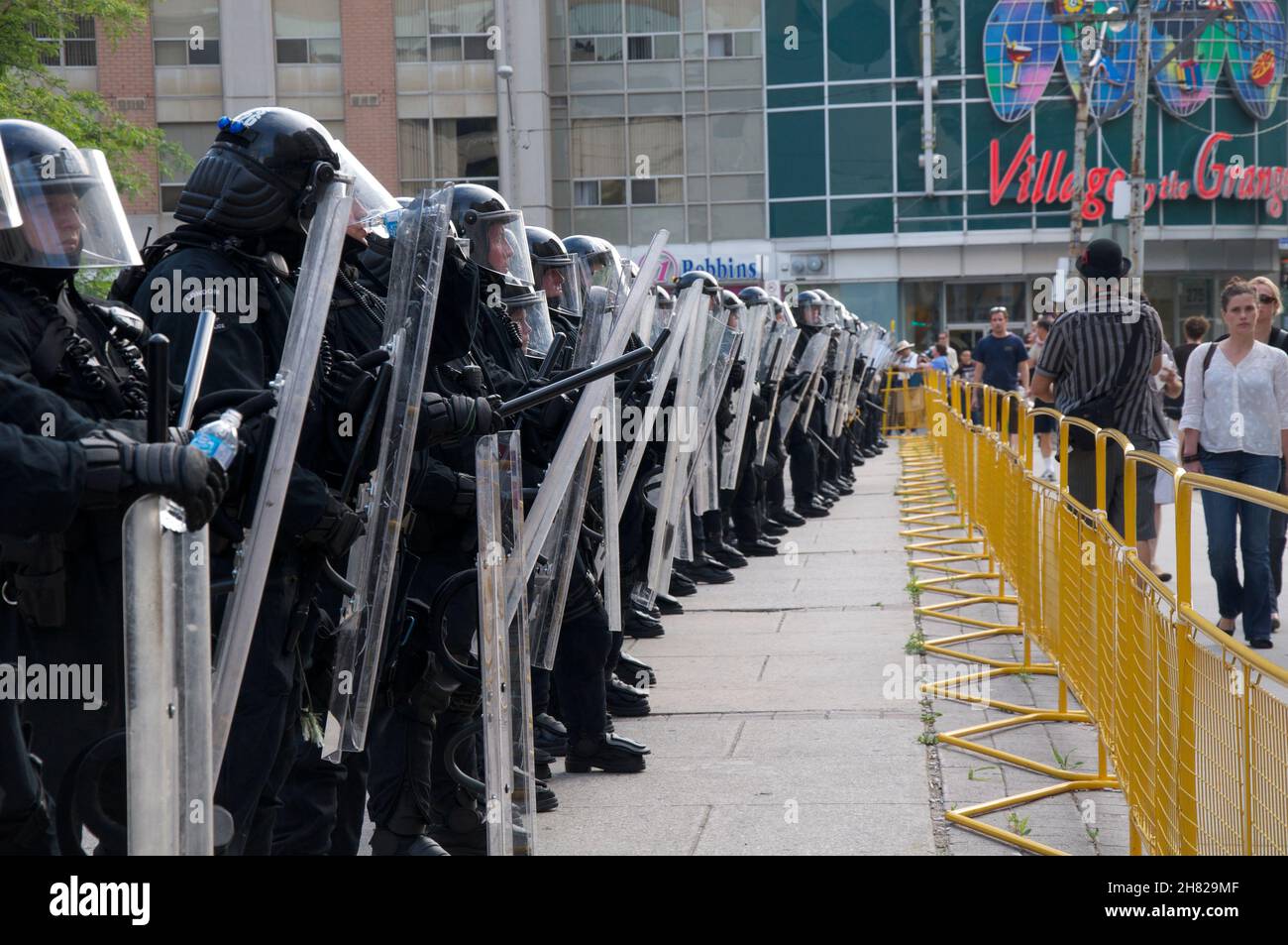 Toronto, Ontario, Canada - 06/25/2010 : Riot Police restrict protesters ...