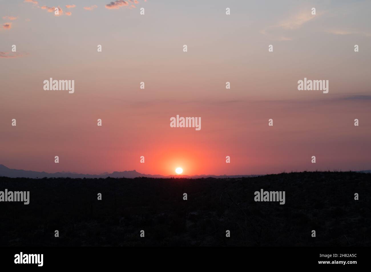 Fire red sunset in Tucson Arizona from nearby wildfires burning Stock ...