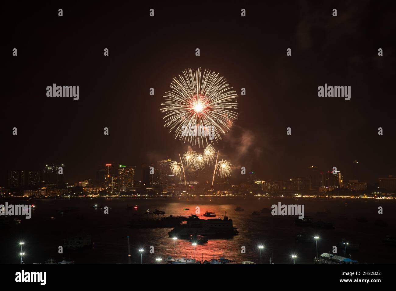 Fireworks light up the sky over the Pattaya beach during the festival ...