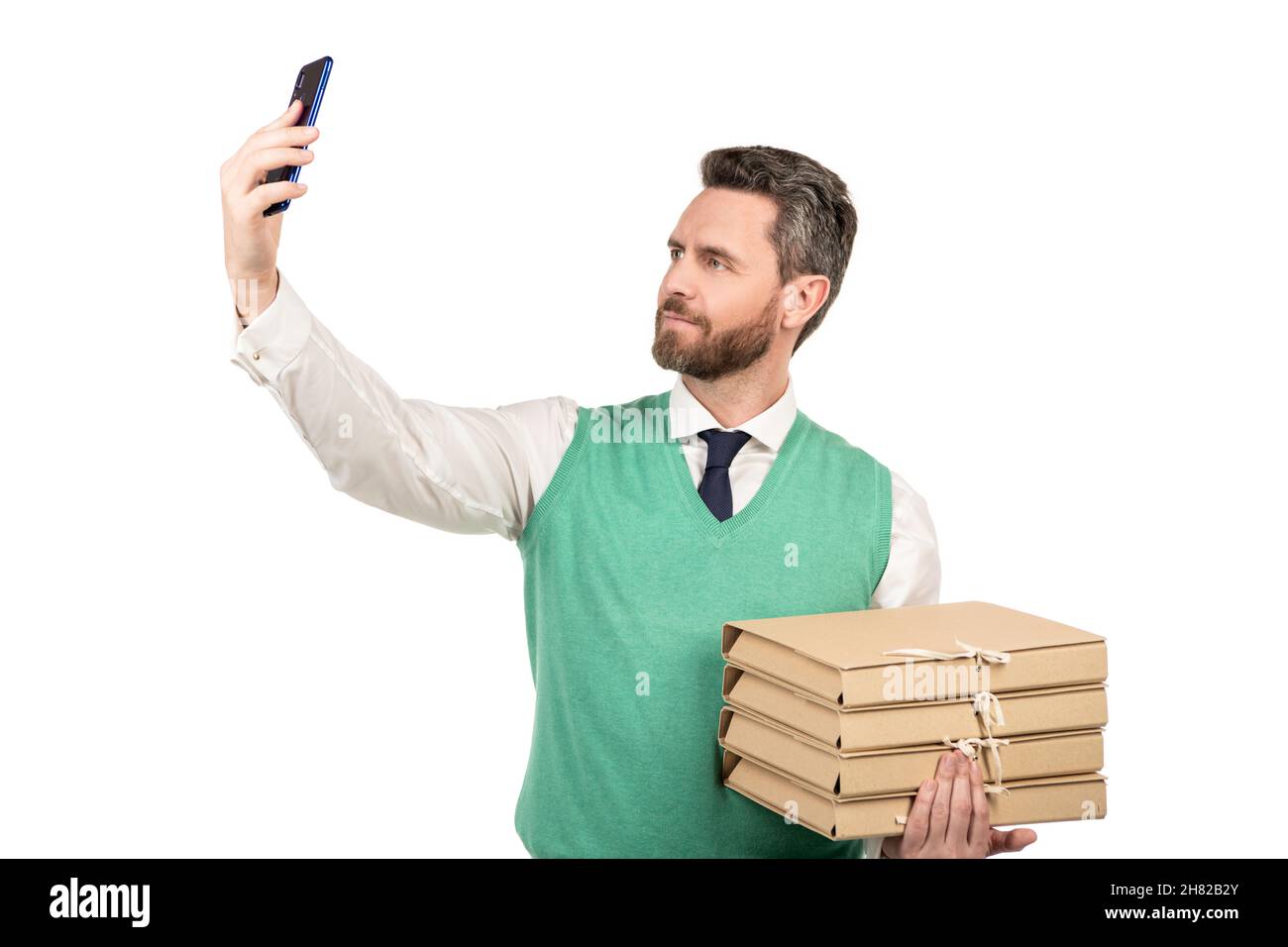 handsome man manager hold heap of folder with documents making selfie ...